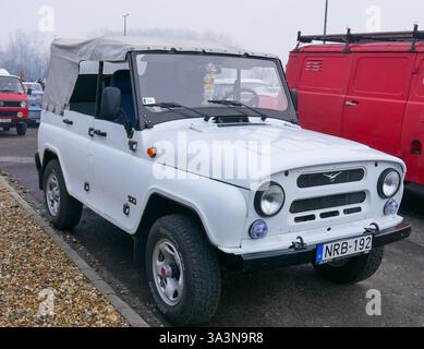 Russian SUV "UAZ hunter 469" 4x4 goes fast, turning tires on a ...