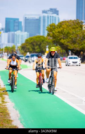 Miami group bike ride Key Biscayne Florida Stock Photo - Alamy