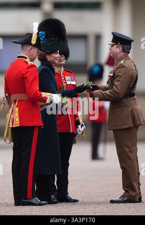 The Princess of Wales presents the traditional sprigs of shamrock to ...