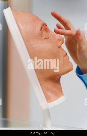 Demonstrating rhinoplasty procedure on a mannequin in the medical ...