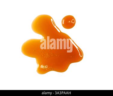 Abstract smear, puddle of sweet caramel isolated on white, top view ...
