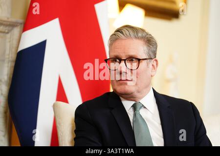 Prime Minister Mark Carney is seen during an event at a grocery store ...