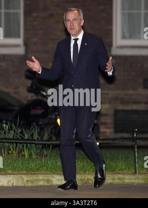 Prime Minister Mark Carney arrives to a caucus meeting on Parliament ...