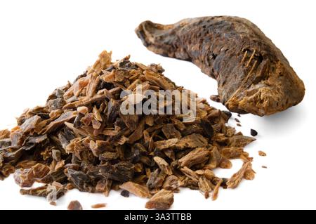 Small heap and chunk of umbalakada aka dry maldive fish on white ...