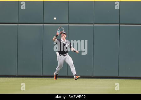 Detroit Tigers' Max Clark catches during workouts at spring training ...
