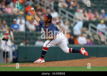 Atlanta Braves pitcher Didier Fuentes throws to a Miami Marlins batter ...