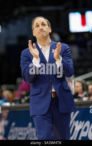 March 12, 2025: Fordham Rams Forward #5 Joshua Rivera tries to push to ...