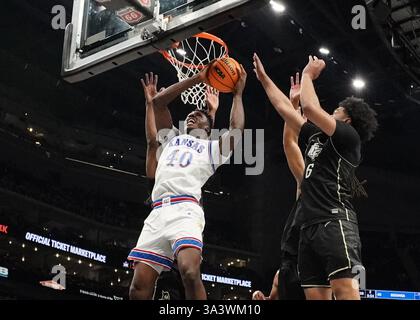 Kansas forward Flory Bidunga (40) blocks a shot by Princeton forward ...