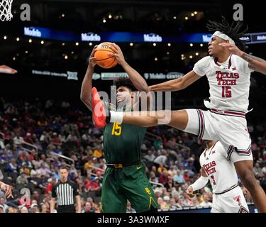 Texas Tech forward JT Toppin (15) brings the ball up court against Sam ...