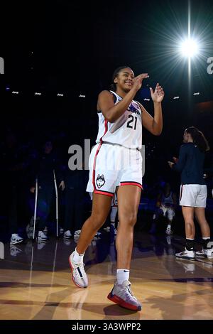 UConn forward Sarah Strong (21) is fouled by South Dakota State forward ...