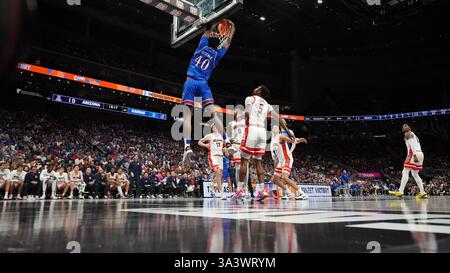 Kansas Jayhawks forward Flory Bidunga (40) on a reverse dunk as Duke ...