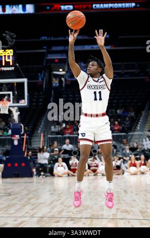 Dayton guard Malachi Smith (11) dribbles during an NCAA college ...