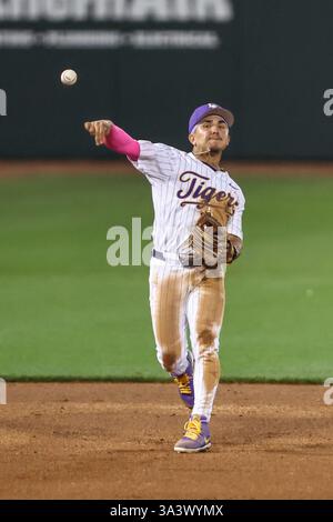 LSU Tigers shortstop Steven Milam (4) throws to first base during an ...