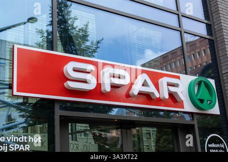 A bright, modern Spar convenience store in Arnhem, Netherlands, on a ...
