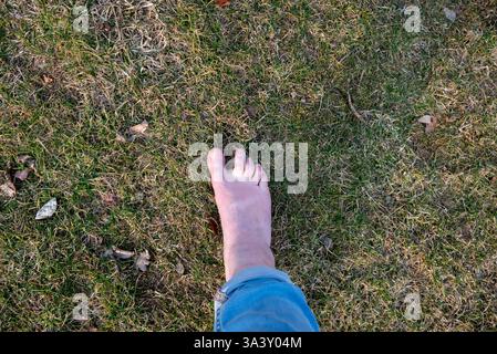 person celebrating go barefoot day by walking without shoes Stock Photo ...