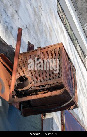 rusty corroded metal box on building wall outdoors Stock Photo - Alamy