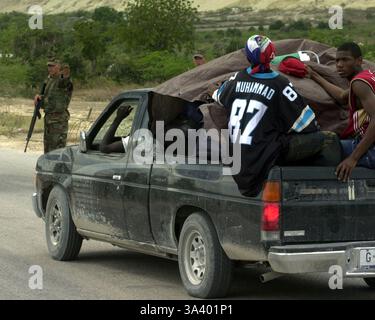 Mar 26, 2004; Port-Au-Prince, Haiti; Haitian National Police check ...