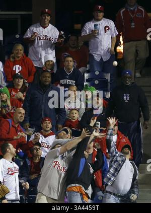 Fans go after a home run hit by Chicago Cubs' Patrick Wisdom during the ...