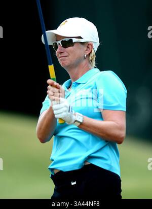 June 18, 2014 - Pinehurst, NC, USA - Cheyenne Woods stops to sign ...
