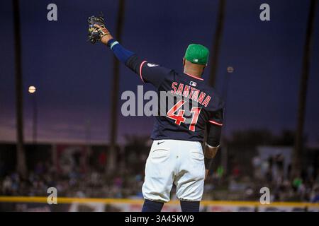 Cleveland Guardians first base Carlos Santana runs under a foul ball ...