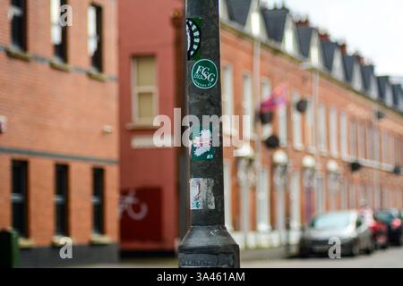 Belfast, United Kingdom 18/03/2025 Irish Unity stickers from Ogra Sinn ...