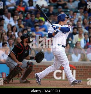 Chicago Cubs' Anthony Rizzo runs to first base during a spring training ...