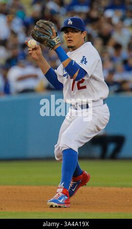 Los Angeles Dodgers' Miguel Rojas (72) gestures after hitting a home ...