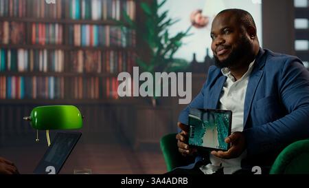 African american CIA expert monitoring reconnaissance satellite ...