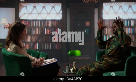 Black combat veteran faces grief and trauma crying at therapy session ...