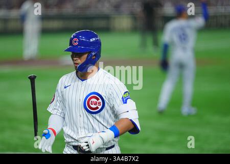 Chicago Cubs' Seiya Suzuki, of Japan, hits a one-run single during the ...