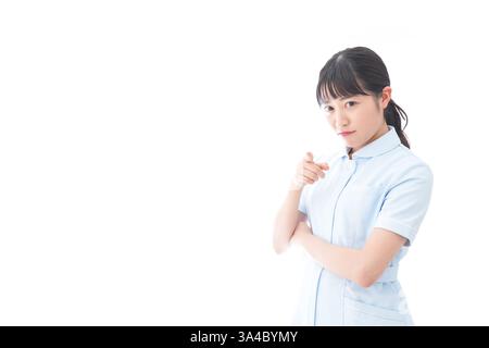 Angry young nurse Stock Photo - Alamy