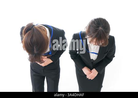 Business people apologising and bowing Stock Photo - Alamy