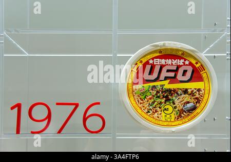 Variety of noodle soup products on display wall in the Instant Noodles ...