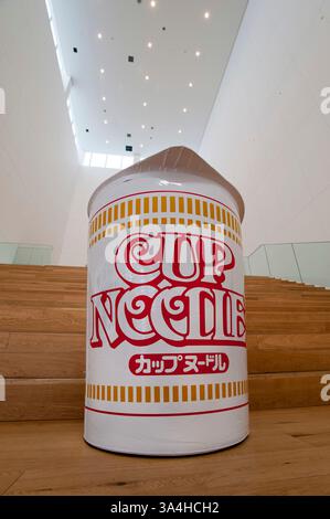 Spacious, multi-story interior entrance lobby at the Nissin Cup Noodles ...