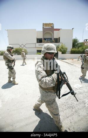 Jun 28, 2004; Ar Ramadi, Iraq; Marines with 2nd Battalion, 4th Marine ...