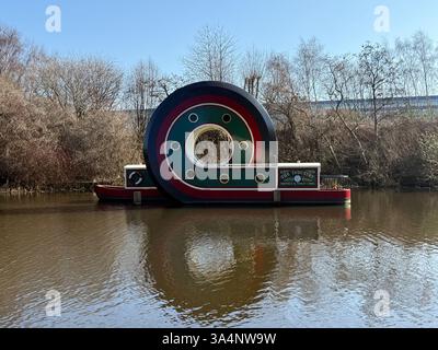 Artist Alex Chinneck with his sculpture of a canal boat after being ...