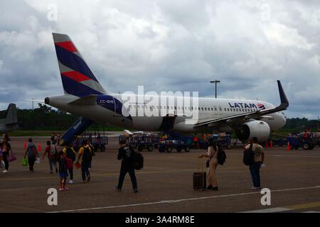Passengers boarding Airbus A320-271N aircraft CC-BHE belonging to LATAM ...