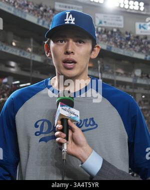 Los Angeles Dodgers' Roki Sasaki pitches during the ninth inning in ...