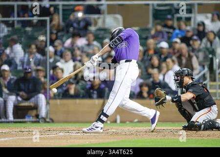 Colorado Rockies outfielder Kris Bryant warms up before a baseball game ...