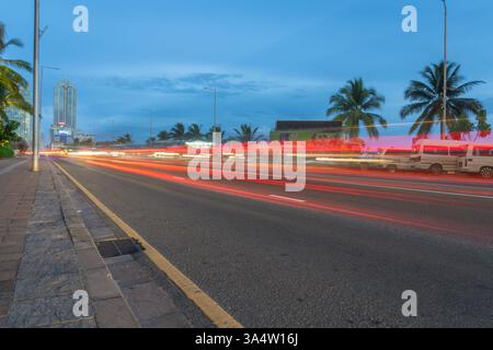 Vehicle light trails along Colombo Main Road at dusk in Sri Lanka Stock ...