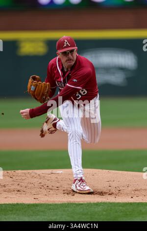 March 19, 2025: Razorback pitcher Colin Fisher (38) follows through on ...