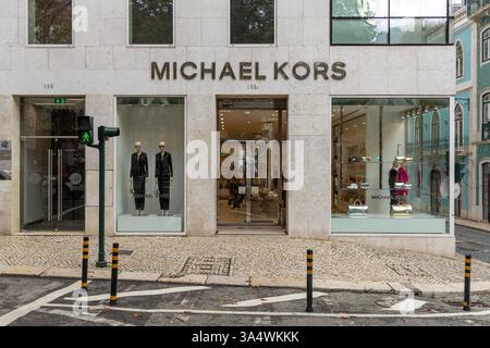Michael Kors letters logo above entrance the shop window. Michael David ...