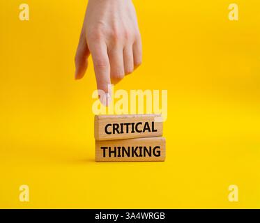 Critical thinking symbol. Wooden blocks with words Critical thinking ...