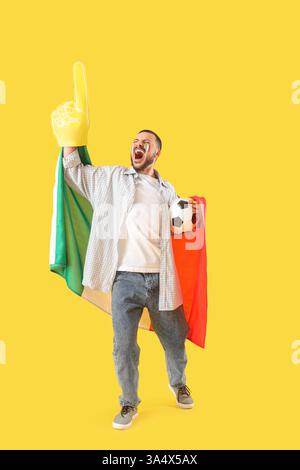 A fan of the Mexican national soccer team talks using a loudspeaker in ...