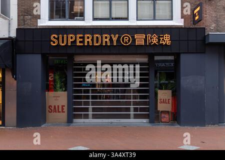 Superdry shop, illuminated neon store logo. Superdry products combine ...