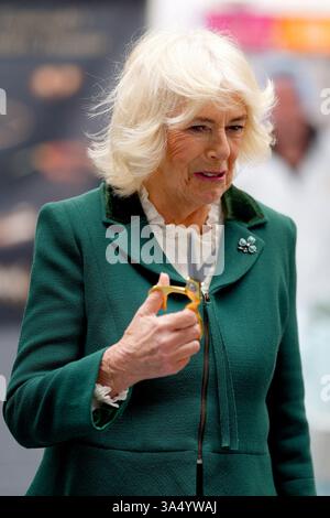 Queen Camilla during a visit to officially open Ratho Library in ...
