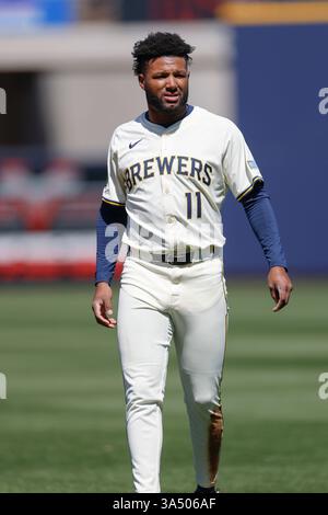 Milwaukee Brewers' Jackson Chourio walks to first base after drawing a ...