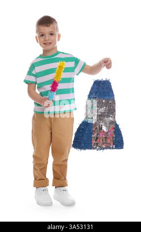 Happy boy with rocket shaped pinata on white background Stock Photo - Alamy