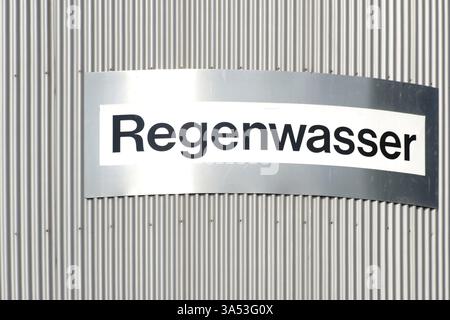 The outer wall of a catch basin for rainwater with a shield Stock Photo ...