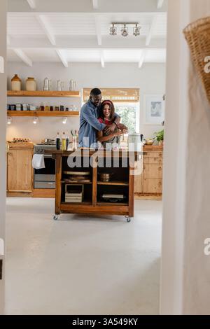 Sharing a Moment in a Cozy Kitchen While Enjoying Each Other's Company ...